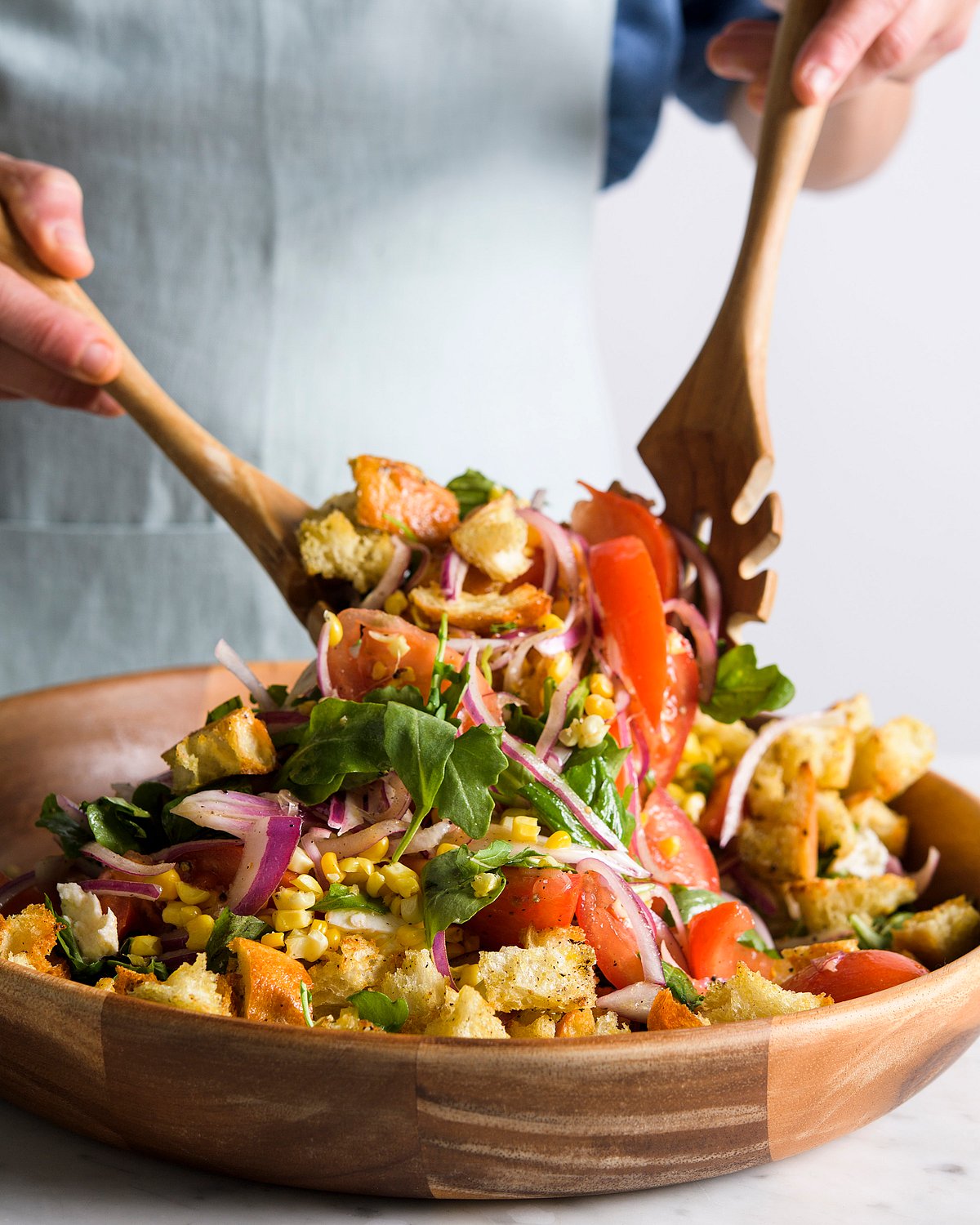 Marinated tomatoes and crisp corn bring punchy summer flavours to this ...