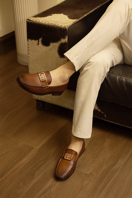 Monogram Revival: Rosso Brunello's Elegant Footwear Collection