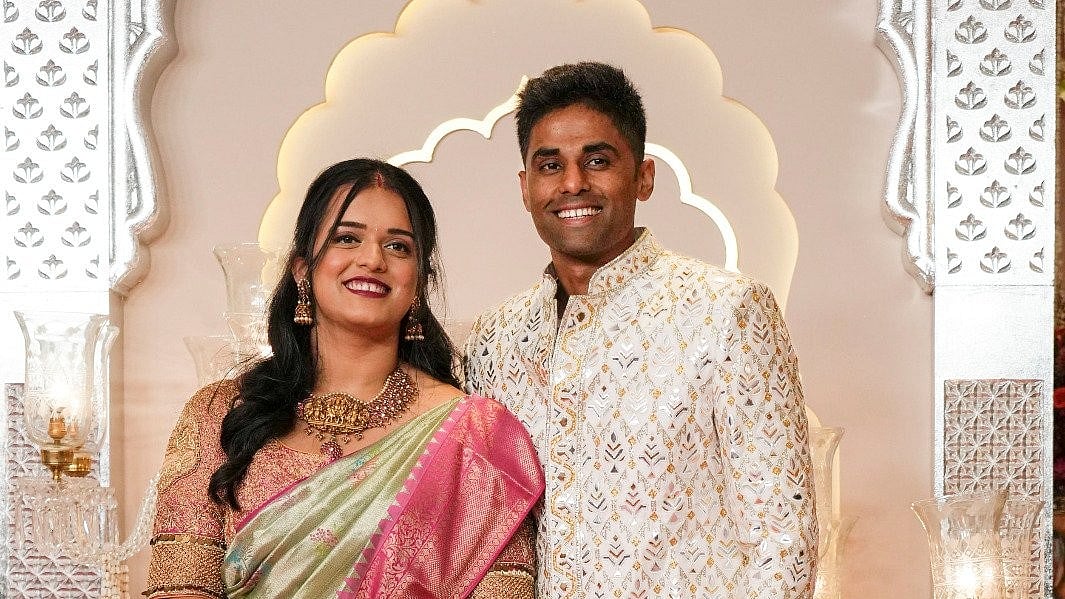 Who is Suryakumar Yadav's wife Devisha and how did they meet?