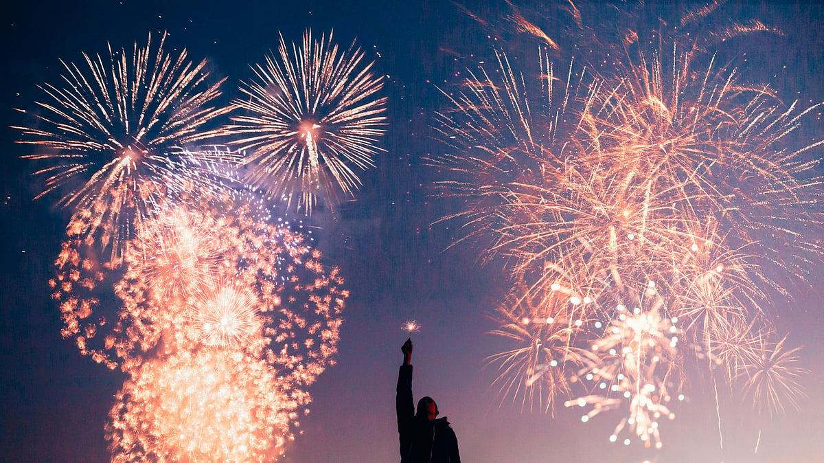 Why do the crackles and lights of fireworks usher in the New Year?
